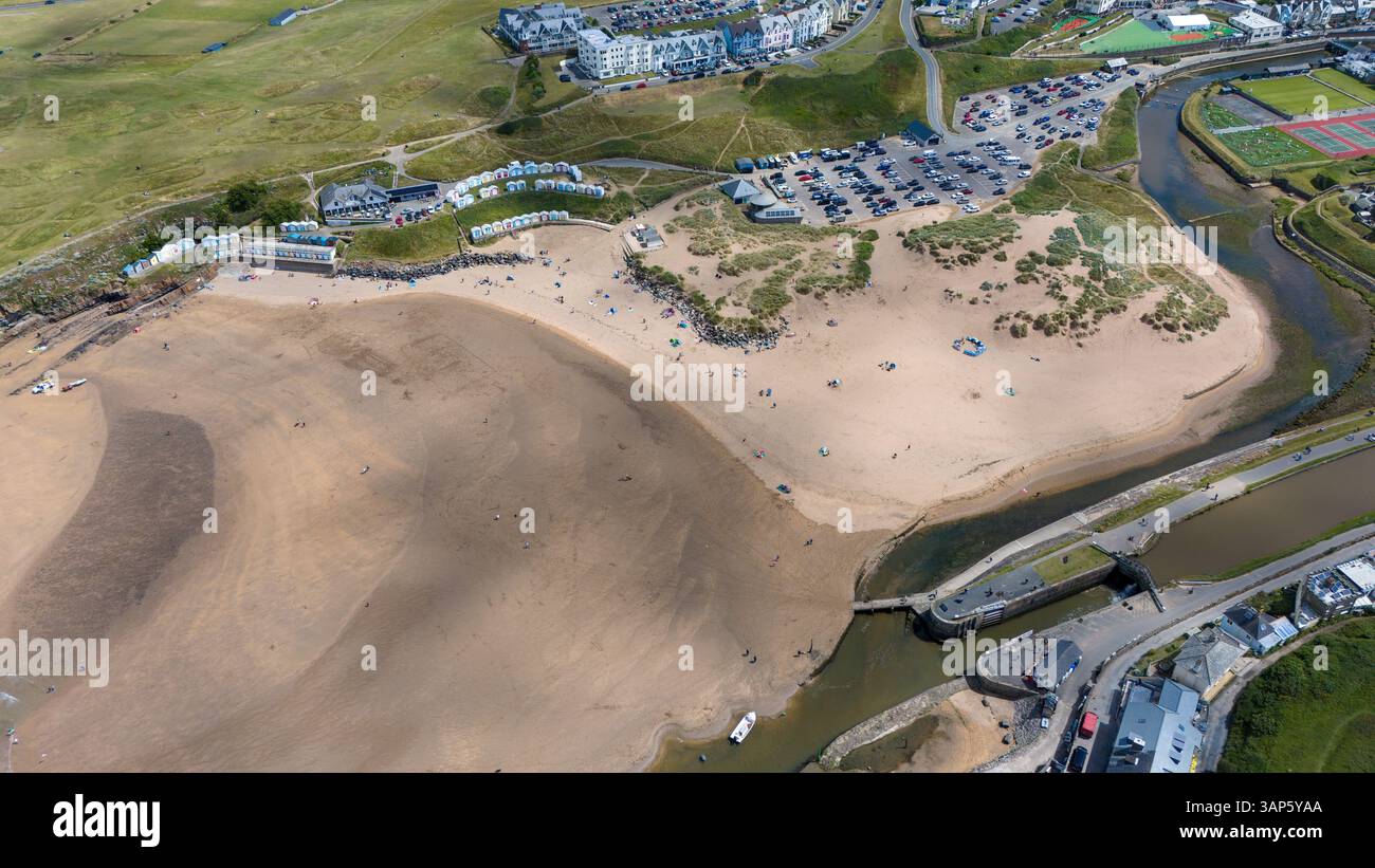 Aerial view of Bude beach with River Neet, sandy shore, and coastal ...