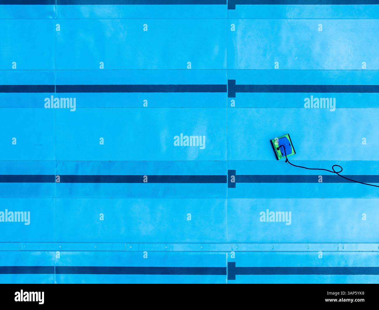 Aerial view of clean and refreshing public swimming pools with a ...