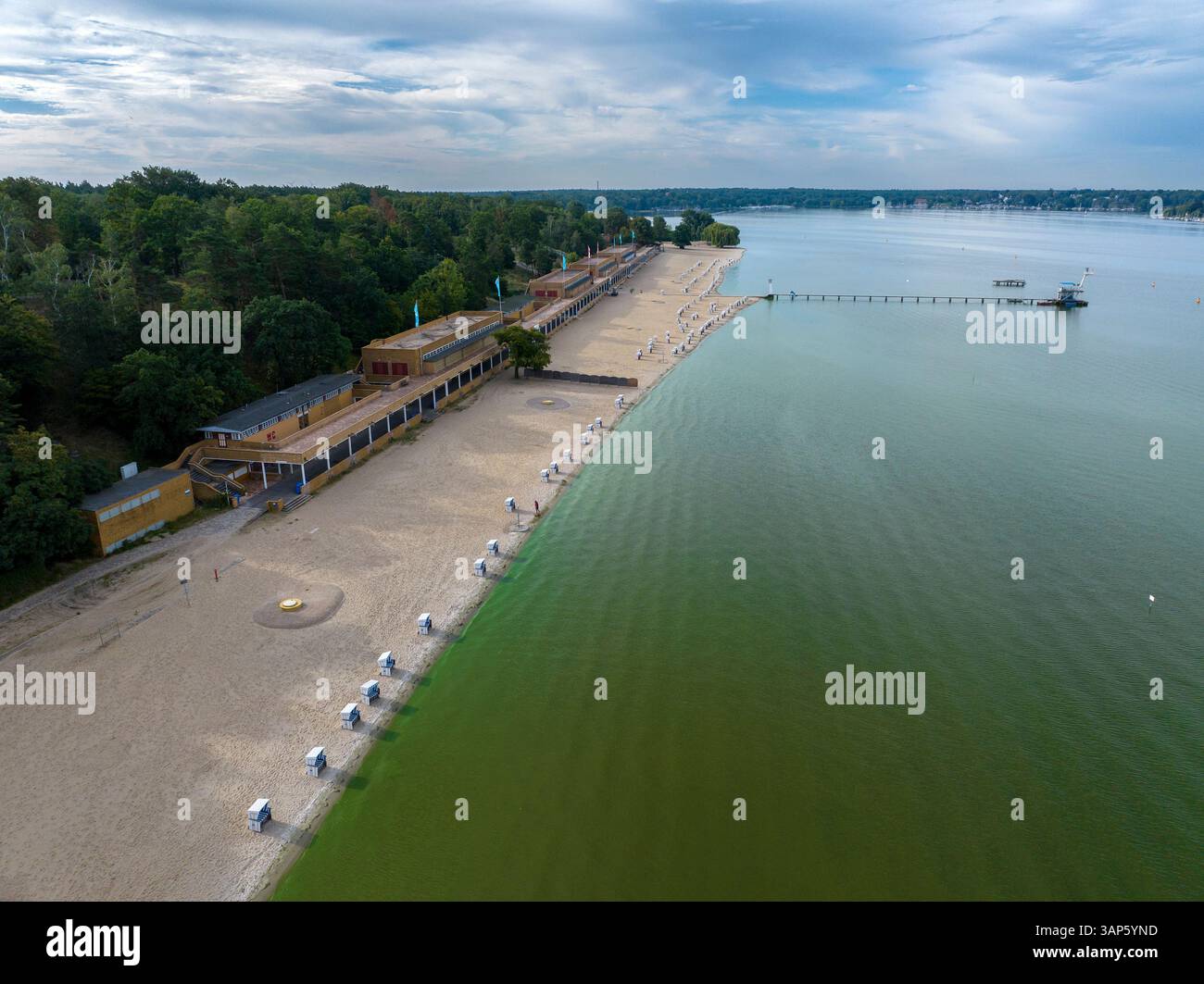 Aerial view of serene strandbad wannsee public beach with sandy shores ...