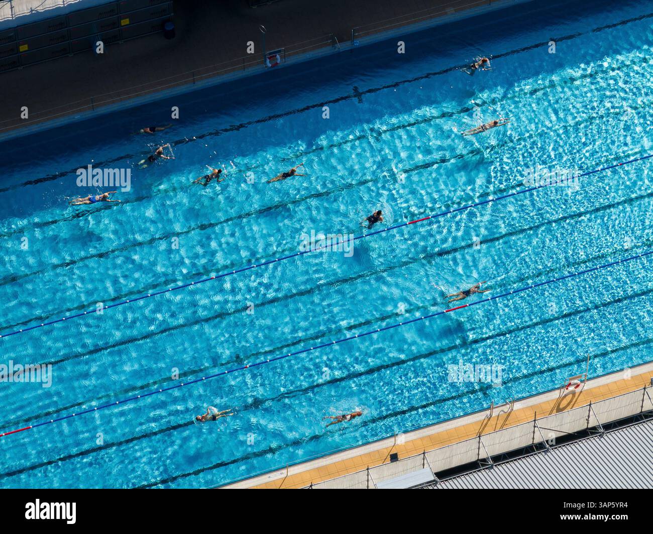 Aerial view of public pools with swimmers enjoying the water, Westend ...