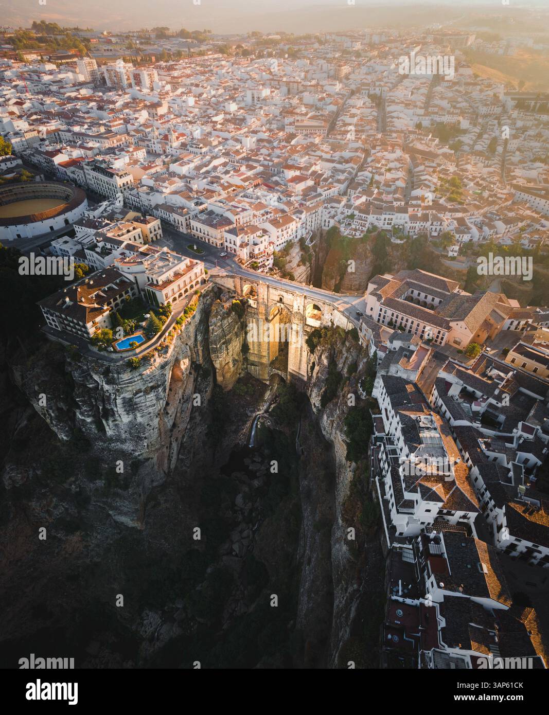 Aerial view of Puente Nuevo, an historical bridge and museum with Ronda townscape in background ...