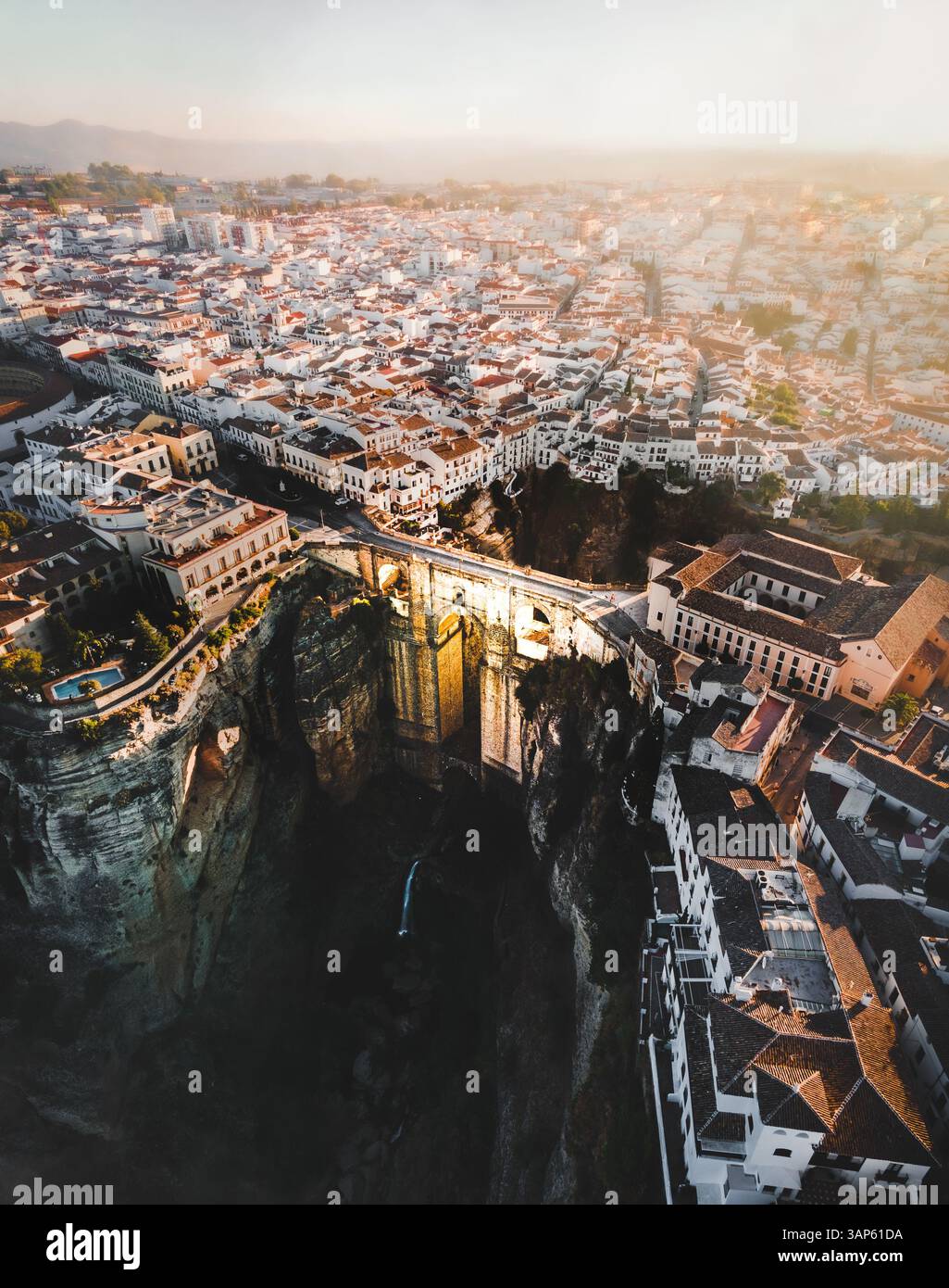 Aerial view of Puente Nuevo, an historical bridge and museum with Ronda townscape in background ...