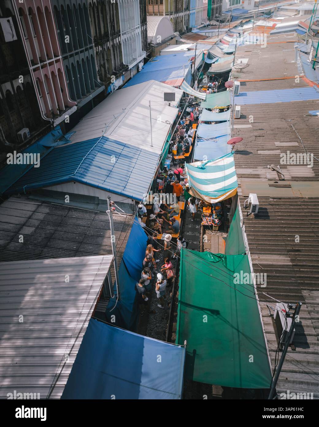 Aerial view of people on the railway at Rom Hup train market in Bangkok ...