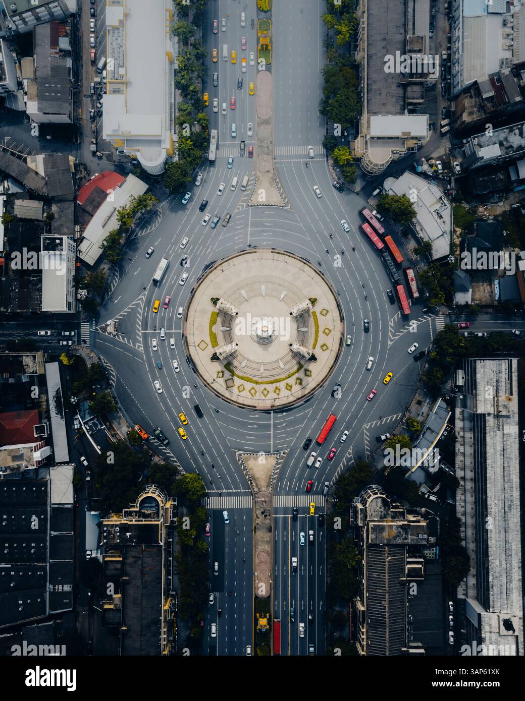 Aerial view of the vehicles driving next to the Democracy Monument at ...