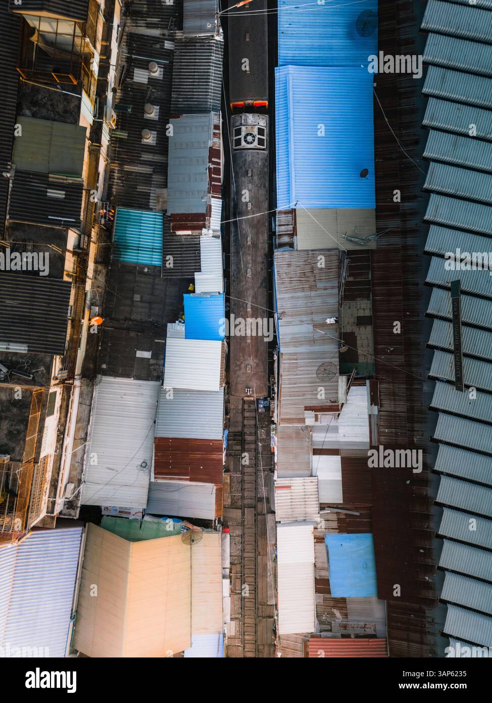 Aerial view of Train passing by the market in Bangkok, Thailand Stock ...