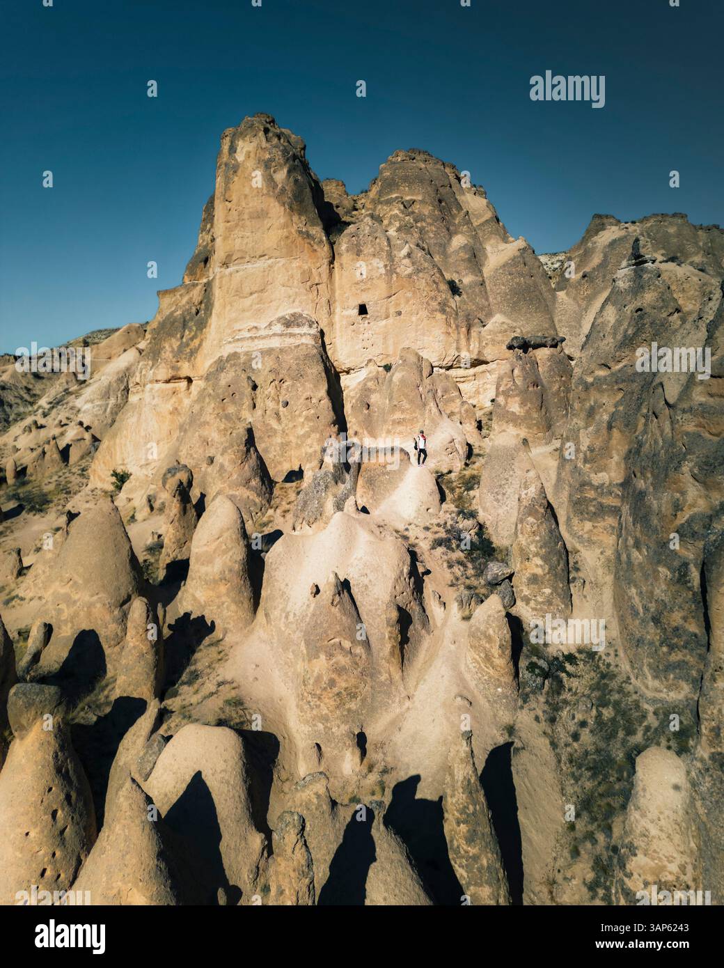 Aerial view of tall, cone-shaped rock formations clustered in Monks ...