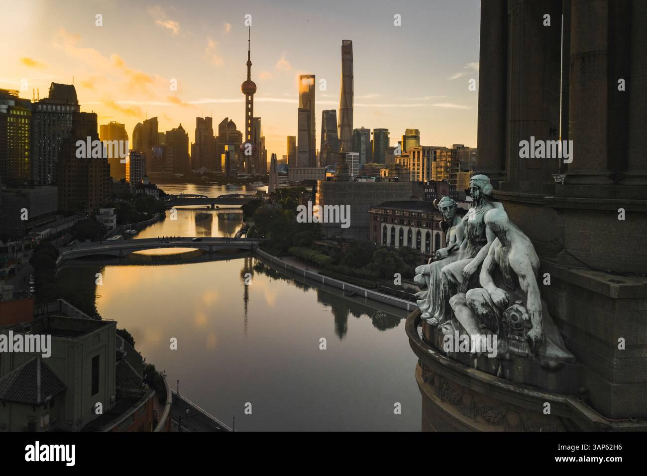 Aerial view of Bund area during sunrise in Shanghai, Hongkou province ...