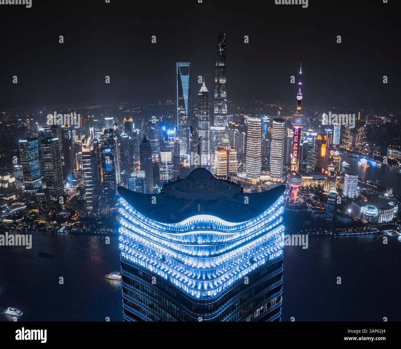 Aerial view of Lujiazui area in Shanghai at night with city skyline in ...