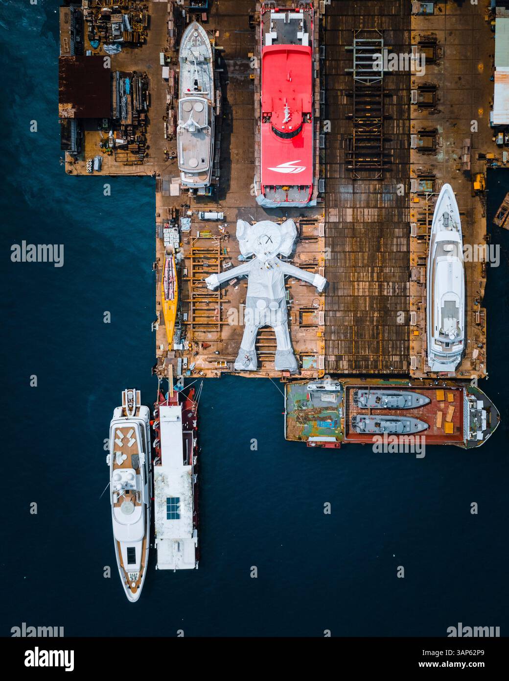 Aerial view of a deflated plastic sculpture at Hong Kong city port ...