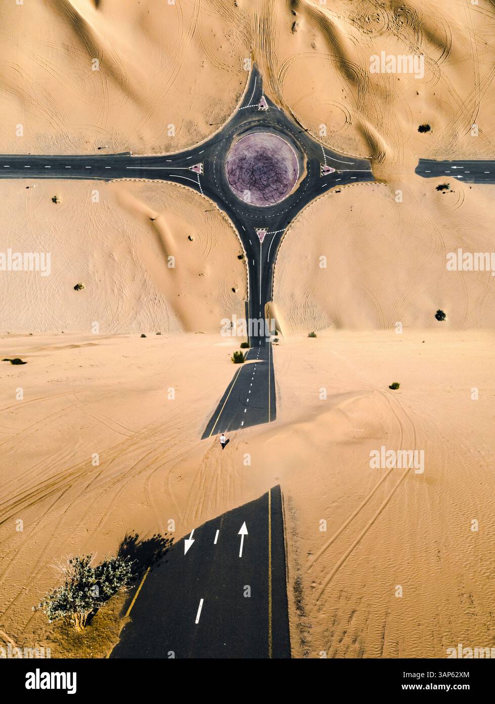 Aerial view of a roundabout in the desert near the city of Dubai ...