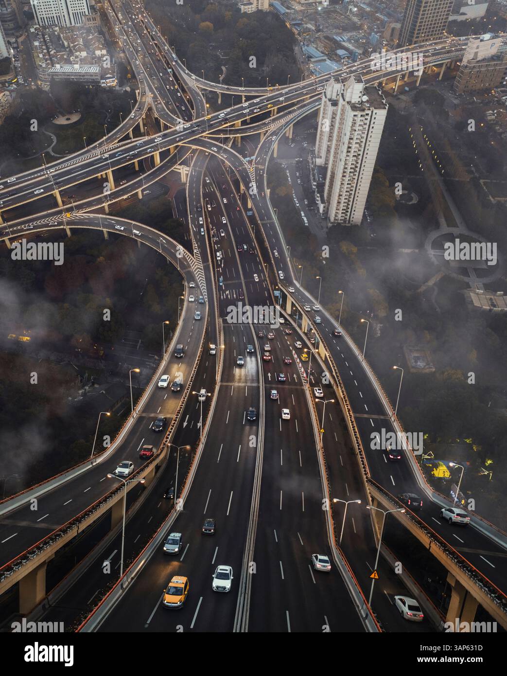 Aerial view of Rainbow road with complex intersection during a foggy ...