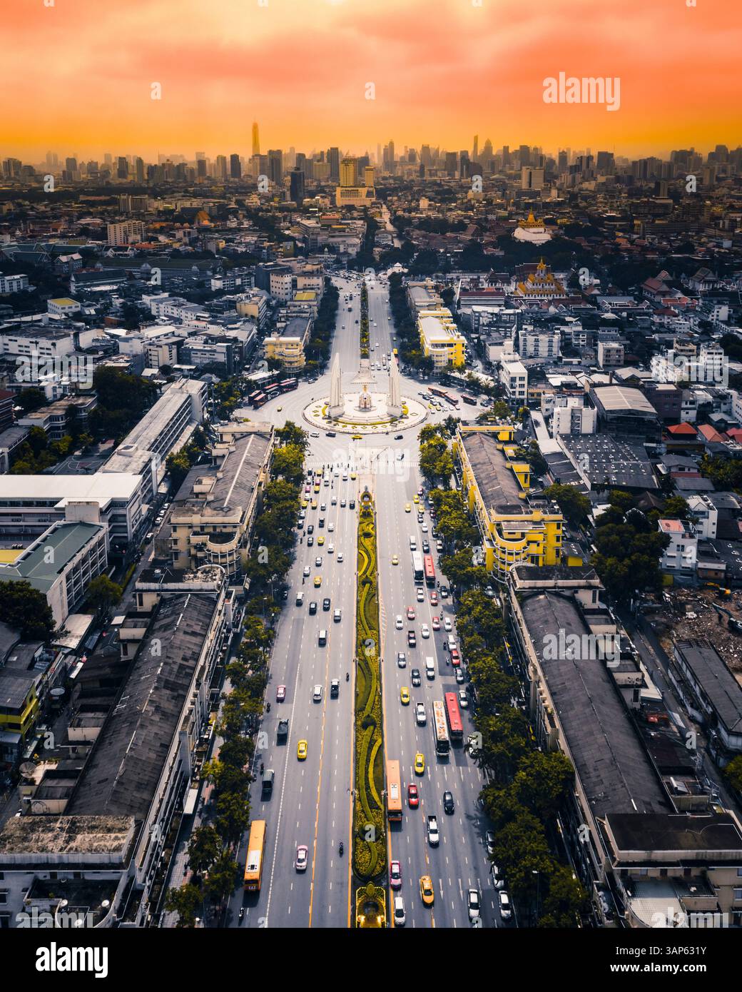 Aerial view of a large road with a monumental roundabout with skyline ...
