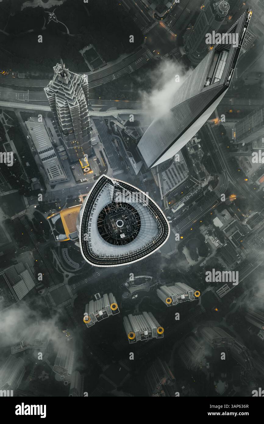 Aerial view of Lujiazui in the clouds at the sunrise, Shanghai, China ...