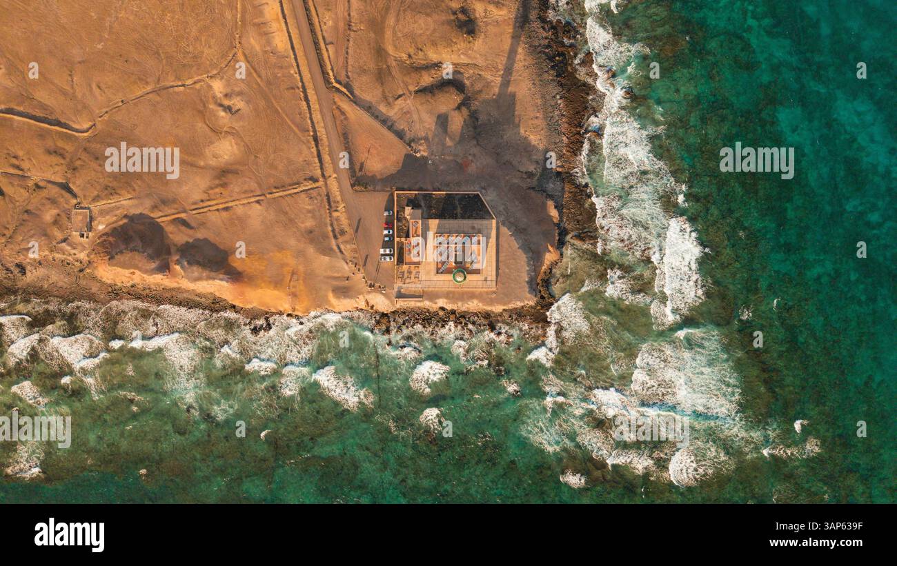Aerial view of lighthouse punta de Jandia with beautiful turquoise ...