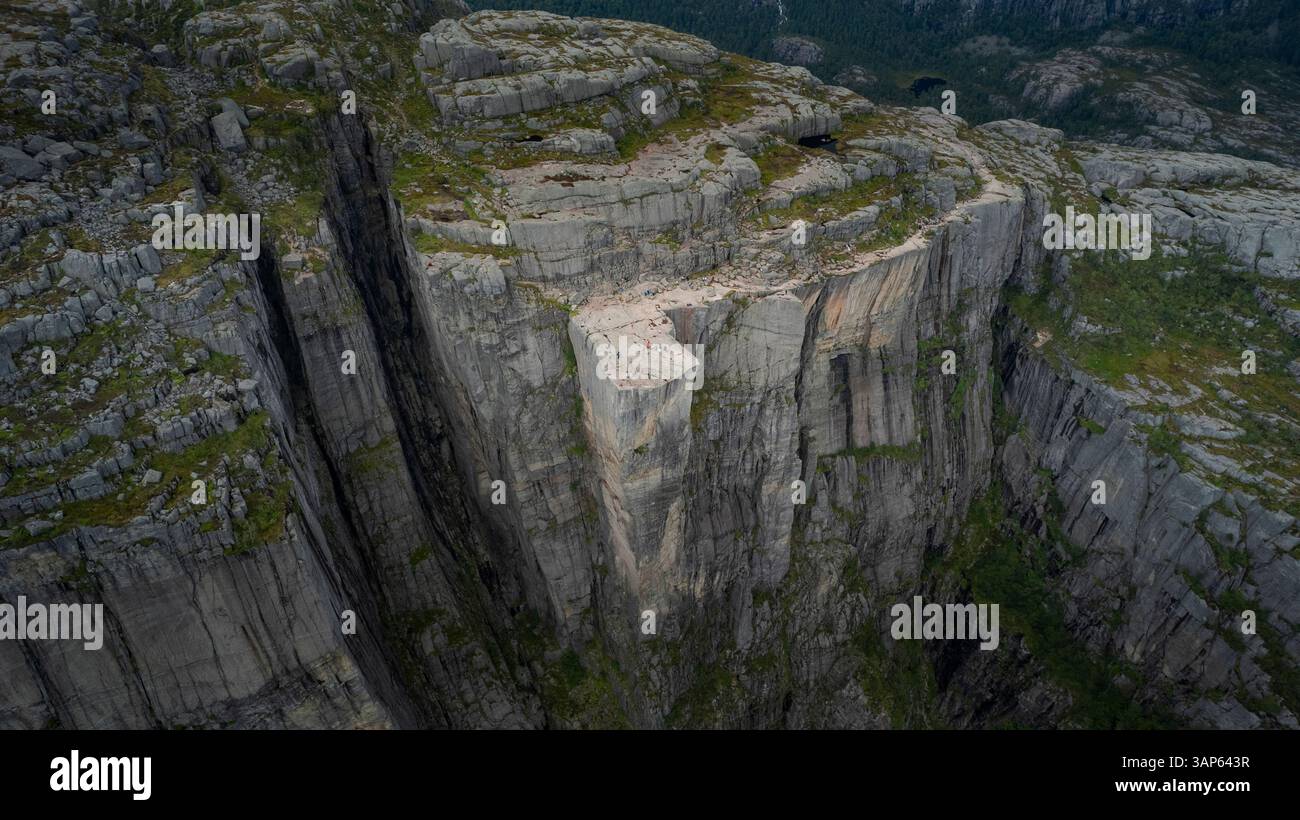 Aerial view of majestic Preikestolen cliff with rugged rock formations ...