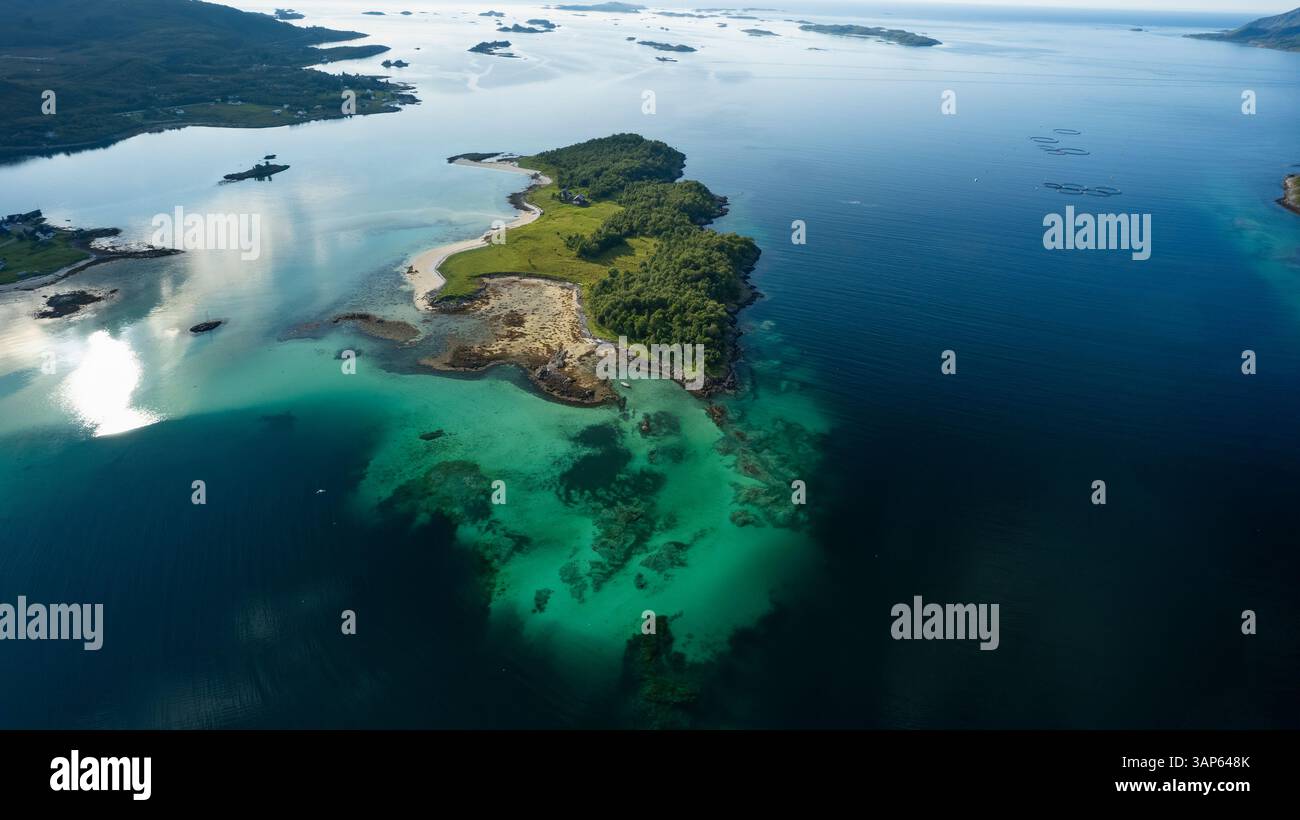 Aerial view of serene and picturesque Senja Island with lush vegetation ...