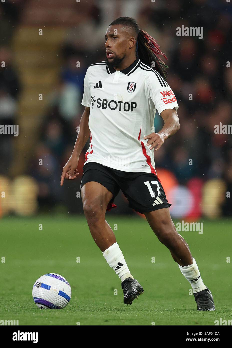 Bournemouth, England, 14th April 2025. Alex Iwobi of Fulham during the ...