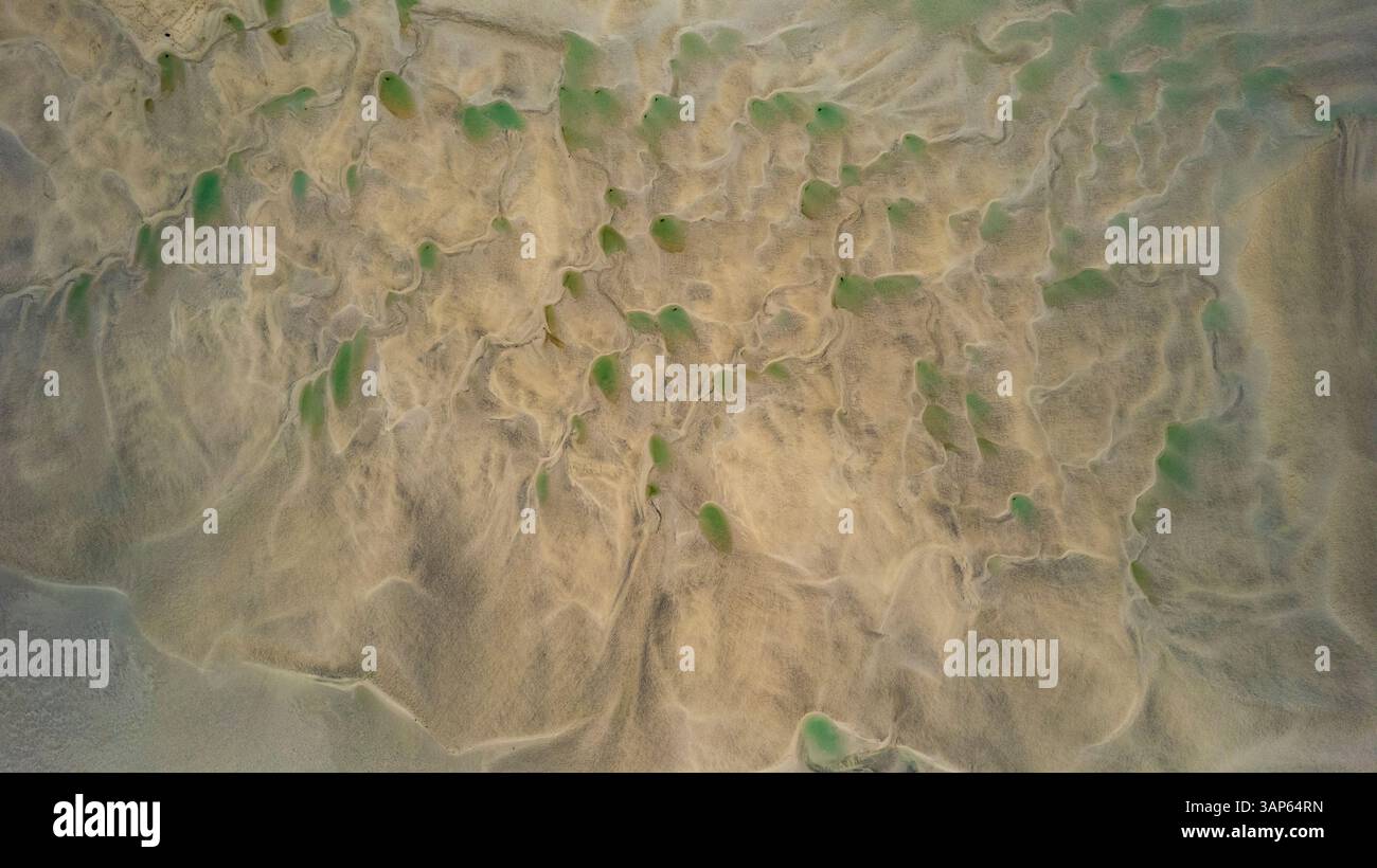 Aerial view of seilebost beach with beautiful sand formations and green ...