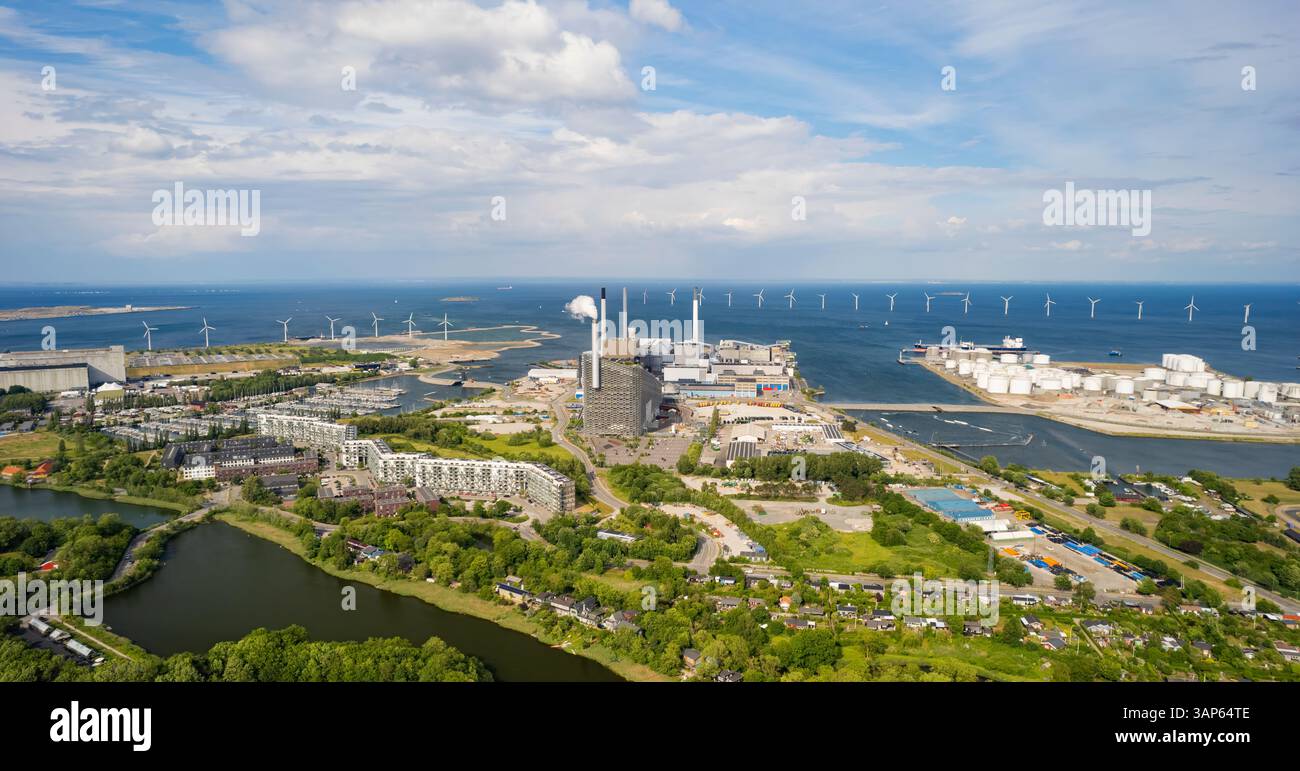 Aerial view of copenhill power plant with wind turbines and harbor ...