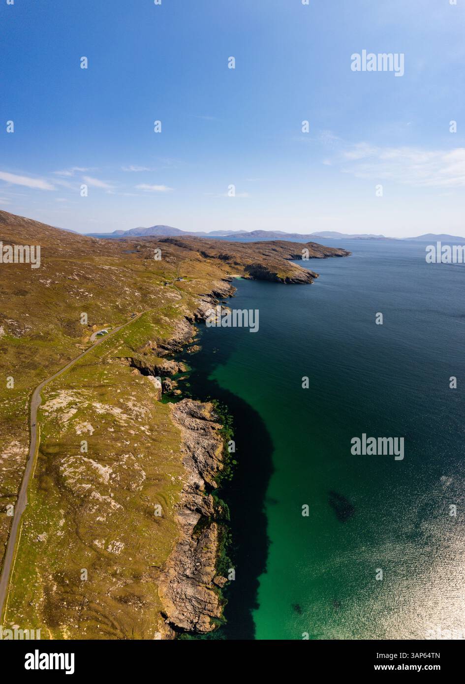 Aerial view of loch crabhadal with rugged cliffs and serene coastline ...