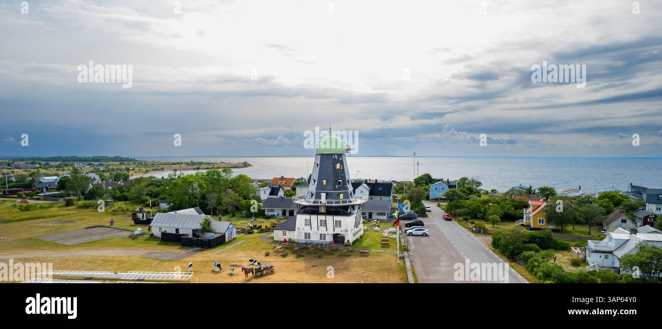 Aerial view of a picturesque traditional mill and charming homes along ...