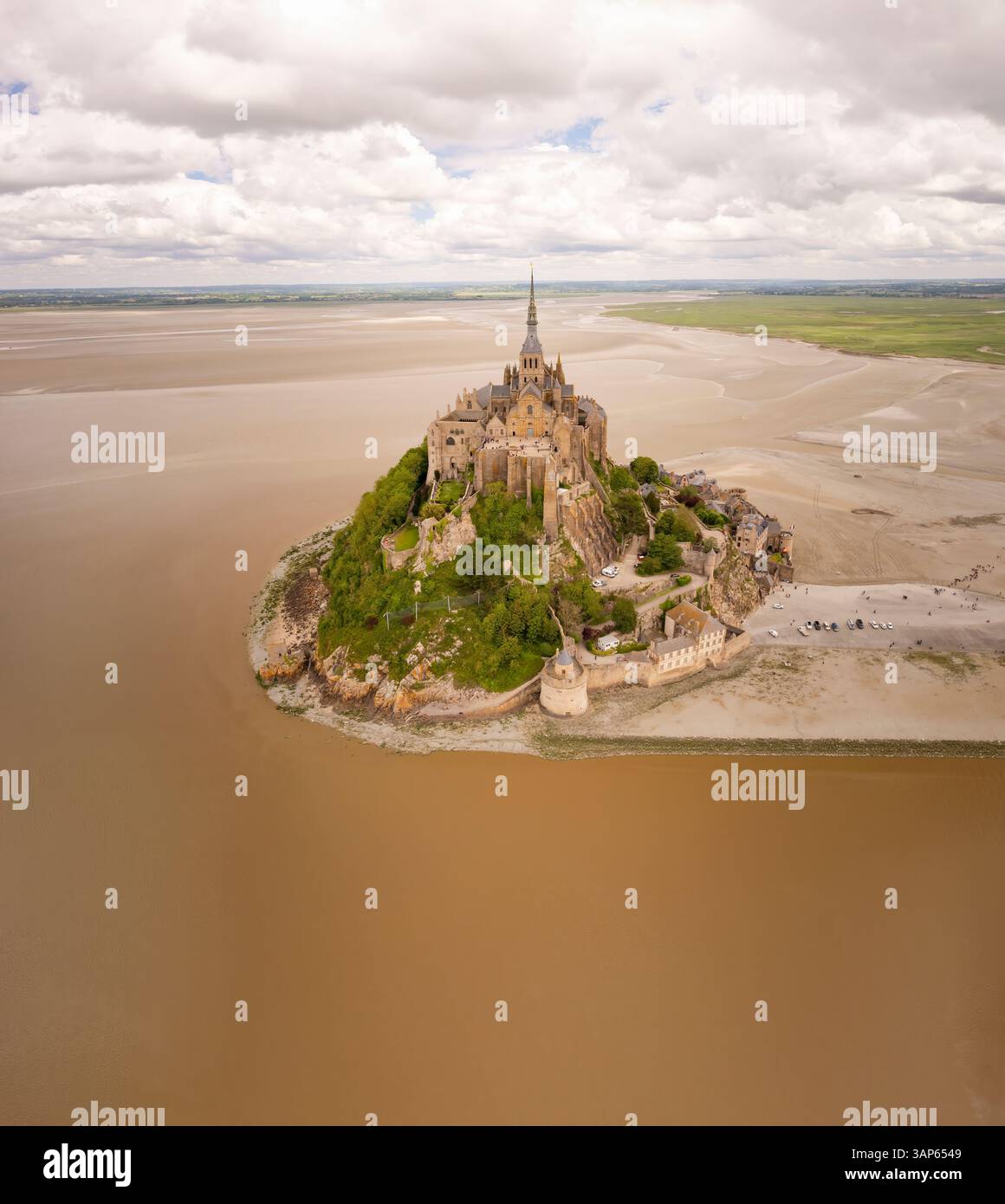 Aerial view of mont saint michel at sunrise with its historic abbey and ...