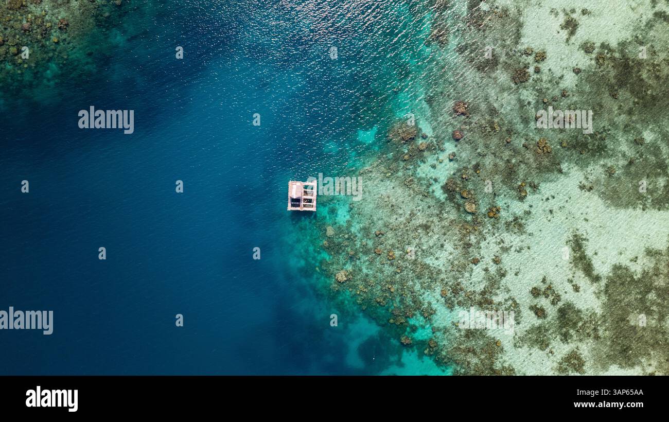 Aerial view of natural bay with beautiful sea and floating platform ...
