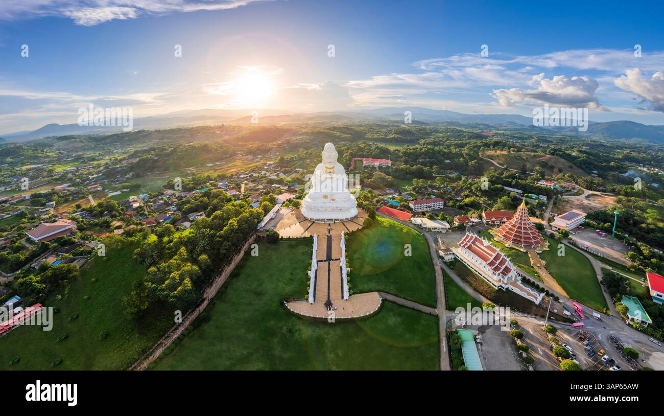 Aerial view of Wat Huay Pla Kang, Goddess of Mercy at sunset with ...