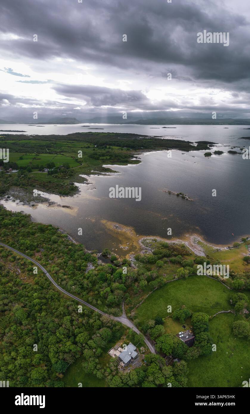 Aerial view of a wild coastline along Lough Mask lake in County Mayo ...