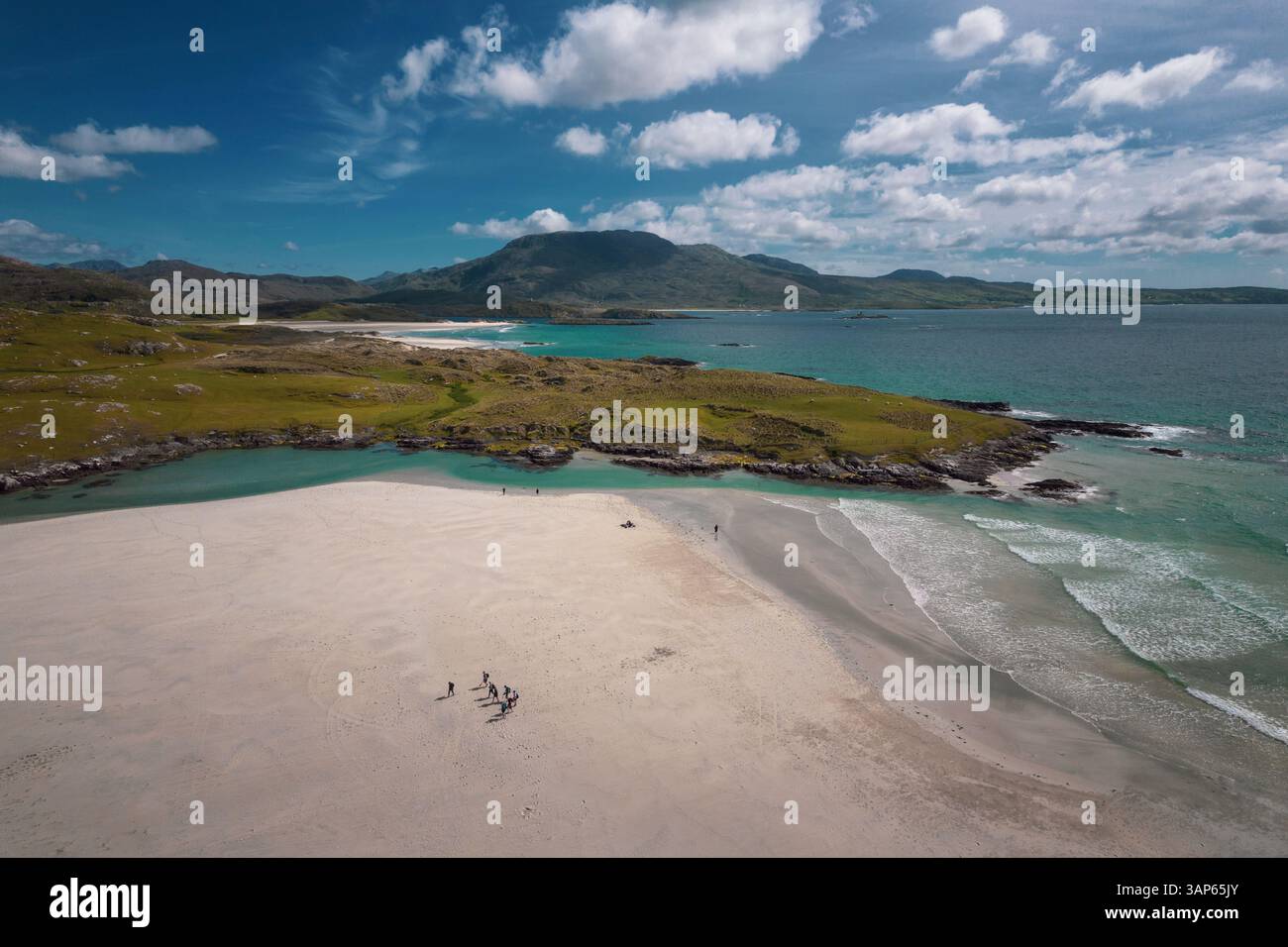 Aerial view of some people on the beach on Silver Strand during a ...