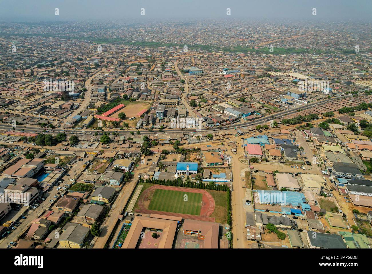 Aerial view of urban Lagos with expansive rooftop development, Lagos ...