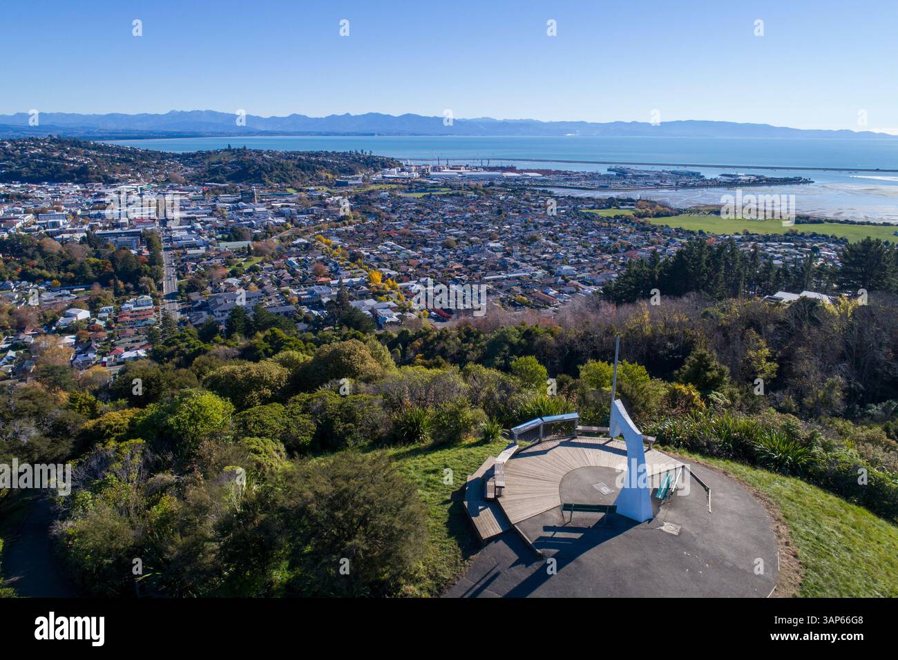 Aerial view of scenic cityscape with mountains and bay surrounded by ...