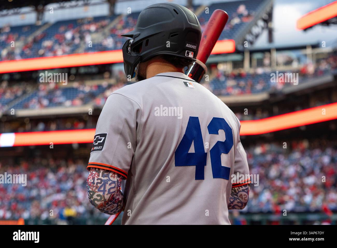 San Francisco Giants' Willy Adames, wearing #42 and arm sleeves with 42 ...