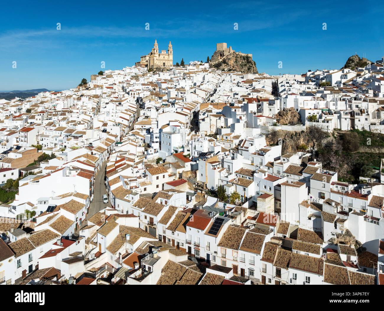 Aerial view of picturesque Olvera with whitewashed buildings, historic ...