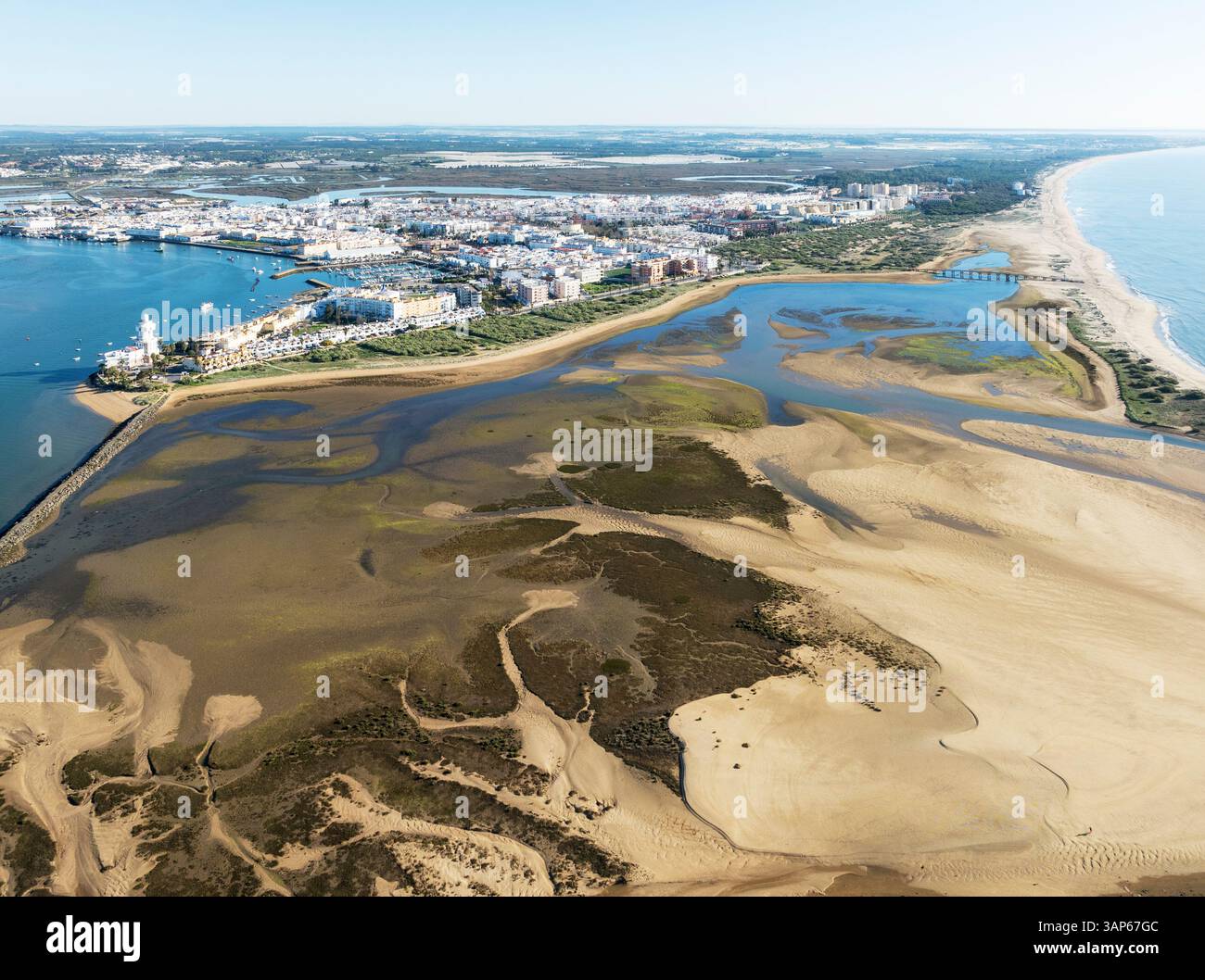 Aerial view of beautiful coastal landscape with sandy beach and urban ...