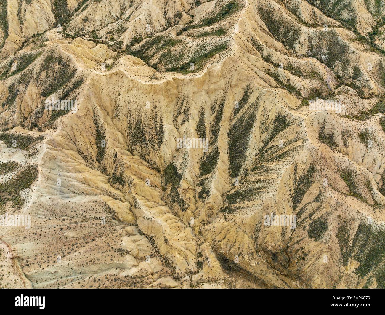 Aerial view of tabernas desert with rugged terrain and rocky formations ...