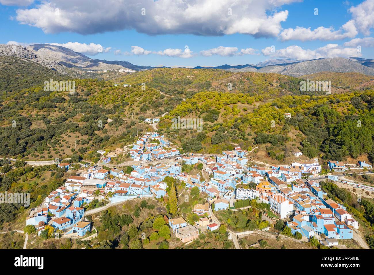 Aerial view of The village of Júzcar above the Genal river valley ...