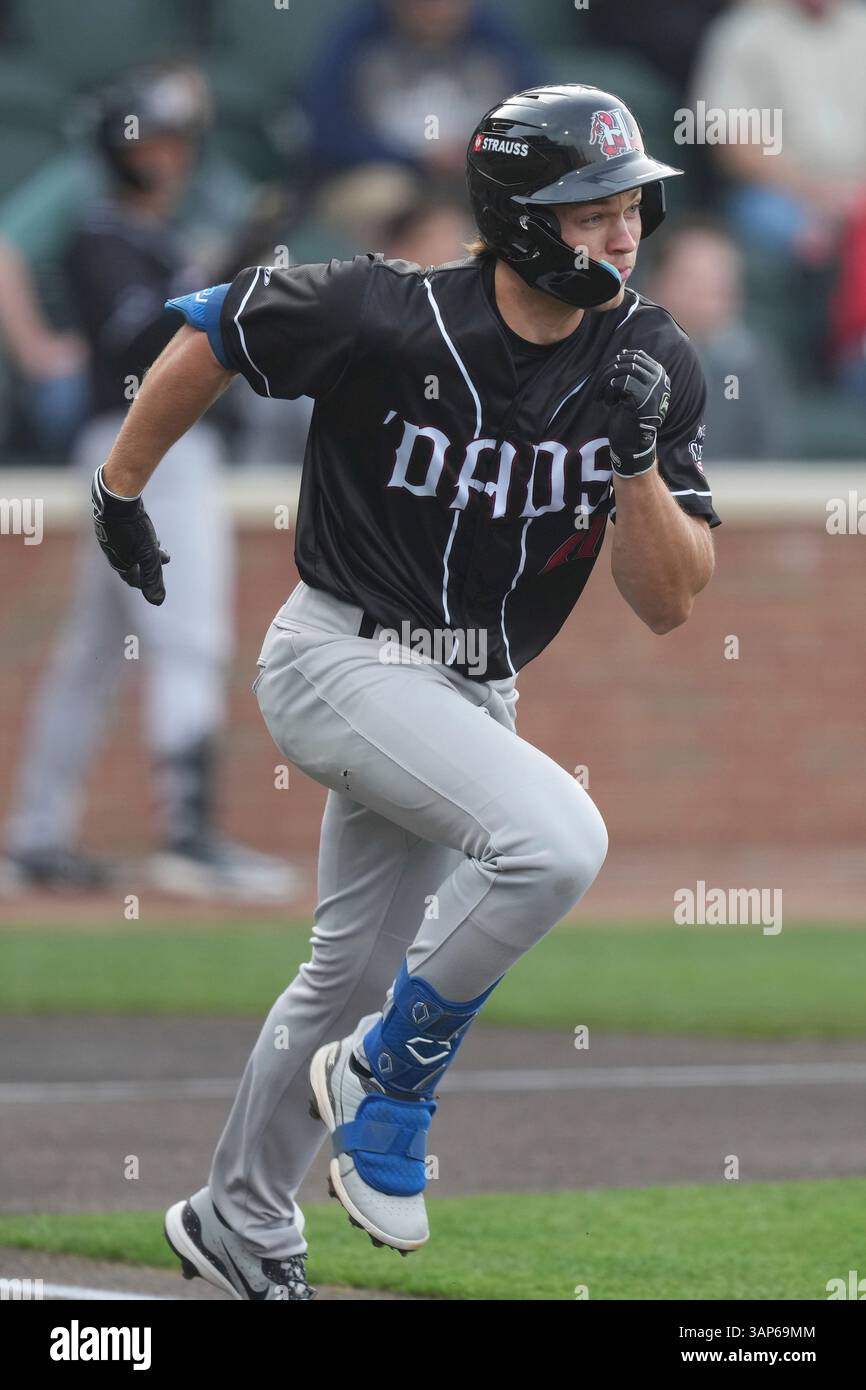 Maxton Martin (41) of the Hickory Crawdads runs out a batted ball in a ...