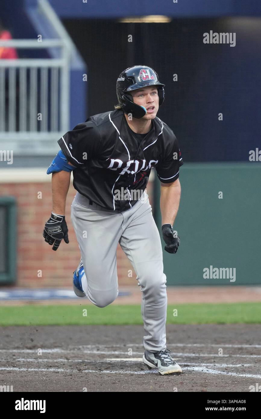 Maxton Martin (41) of the Hickory Crawdads runs out a batted ball in a ...