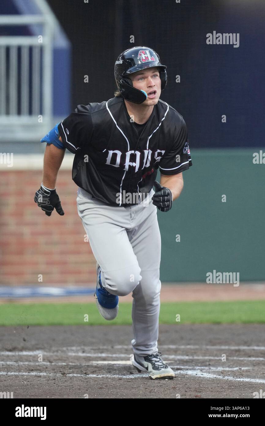 Maxton Martin (41) of the Hickory Crawdads runs out a batted ball in a ...
