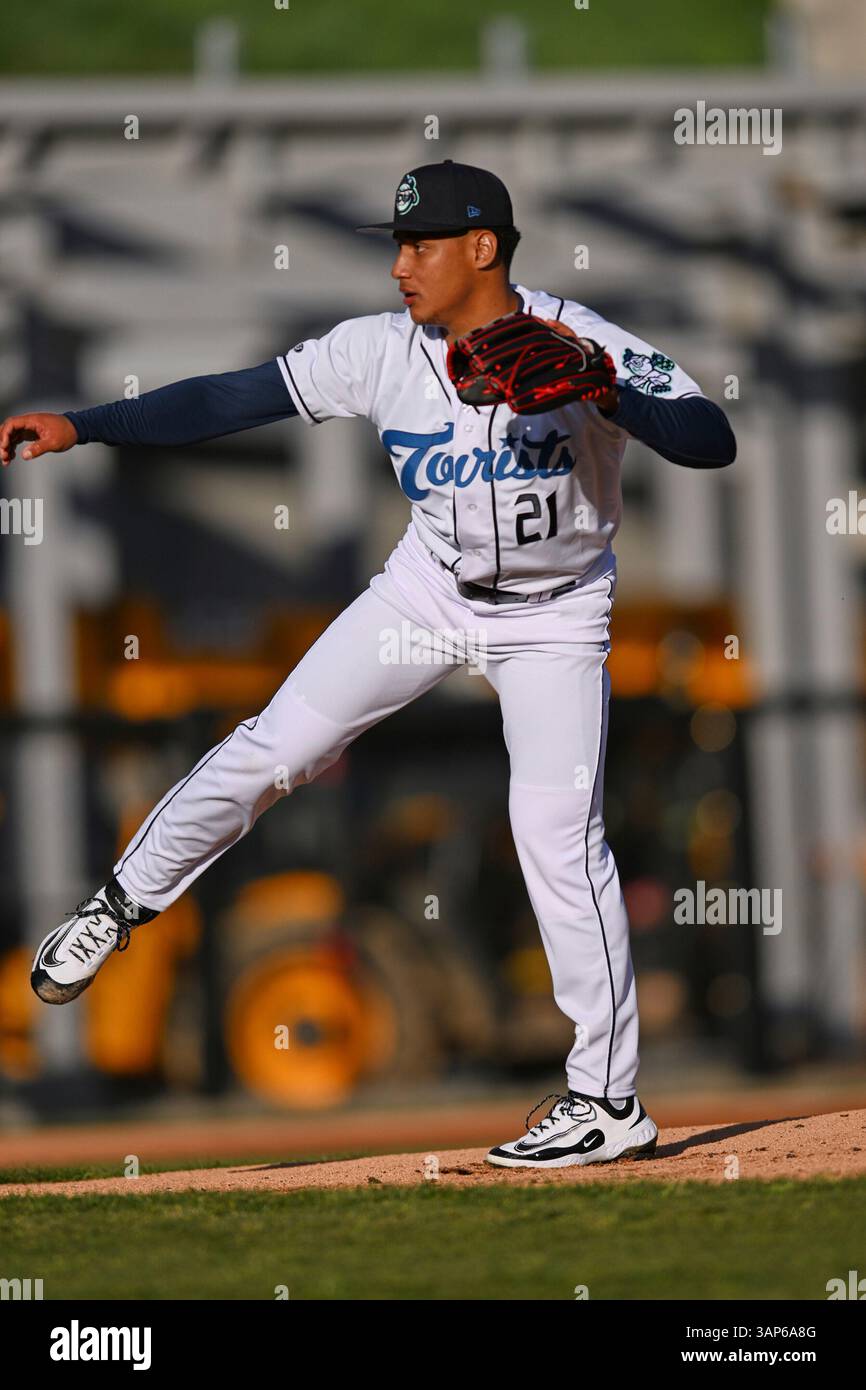Asheville Tourists starting pitcher Anderson Brito (21) delivers a ...