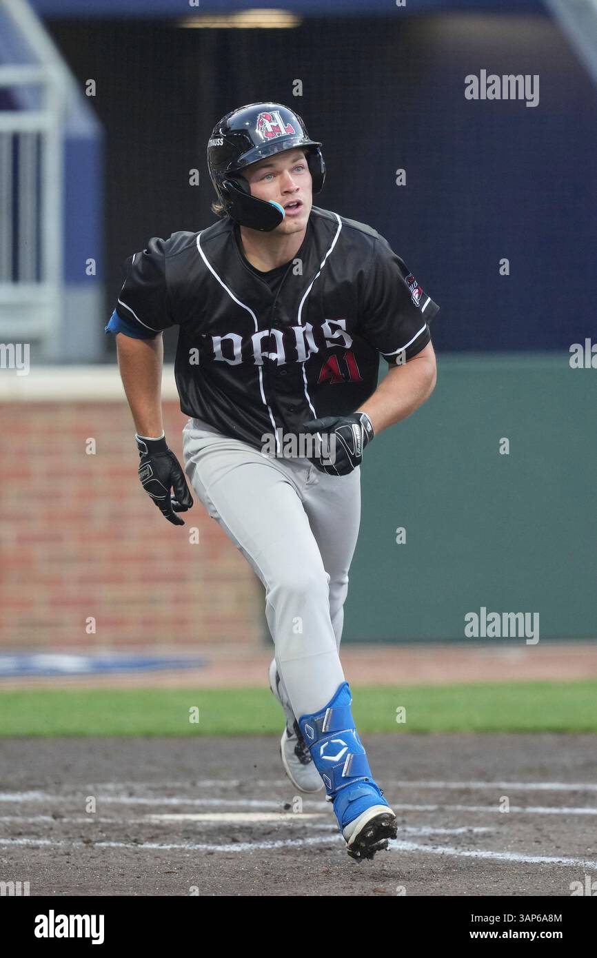 Maxton Martin (41) of the Hickory Crawdads runs out a batted ball in a ...