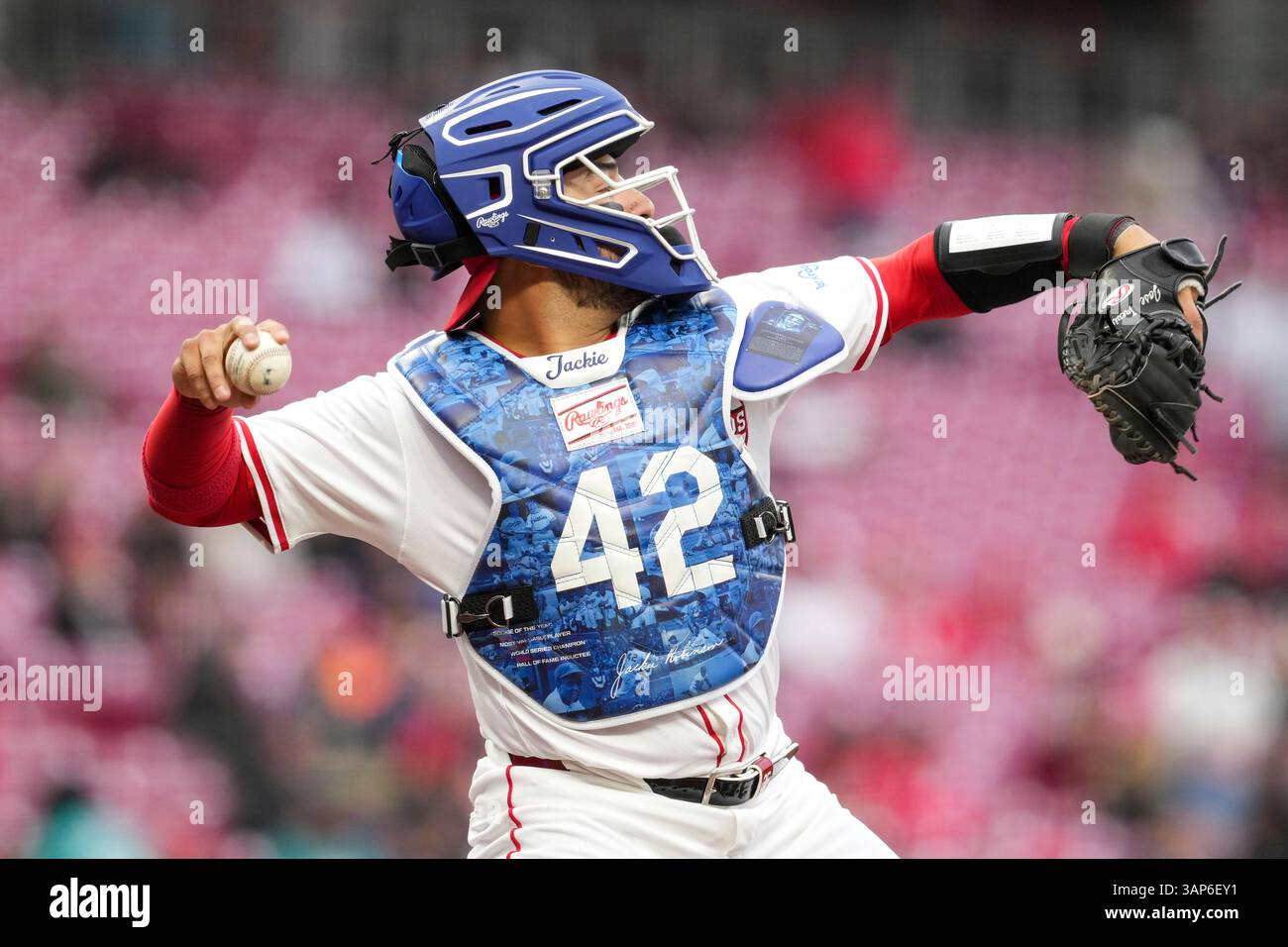 Cincinnati Reds catcher Jose Trevino warms up while wearing catching ...