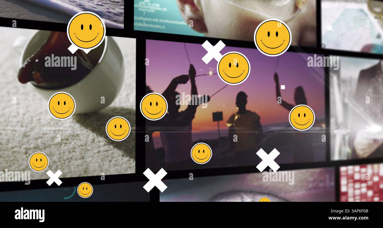 Image of falling emoji over screens on black background Stock Photo - Alamy