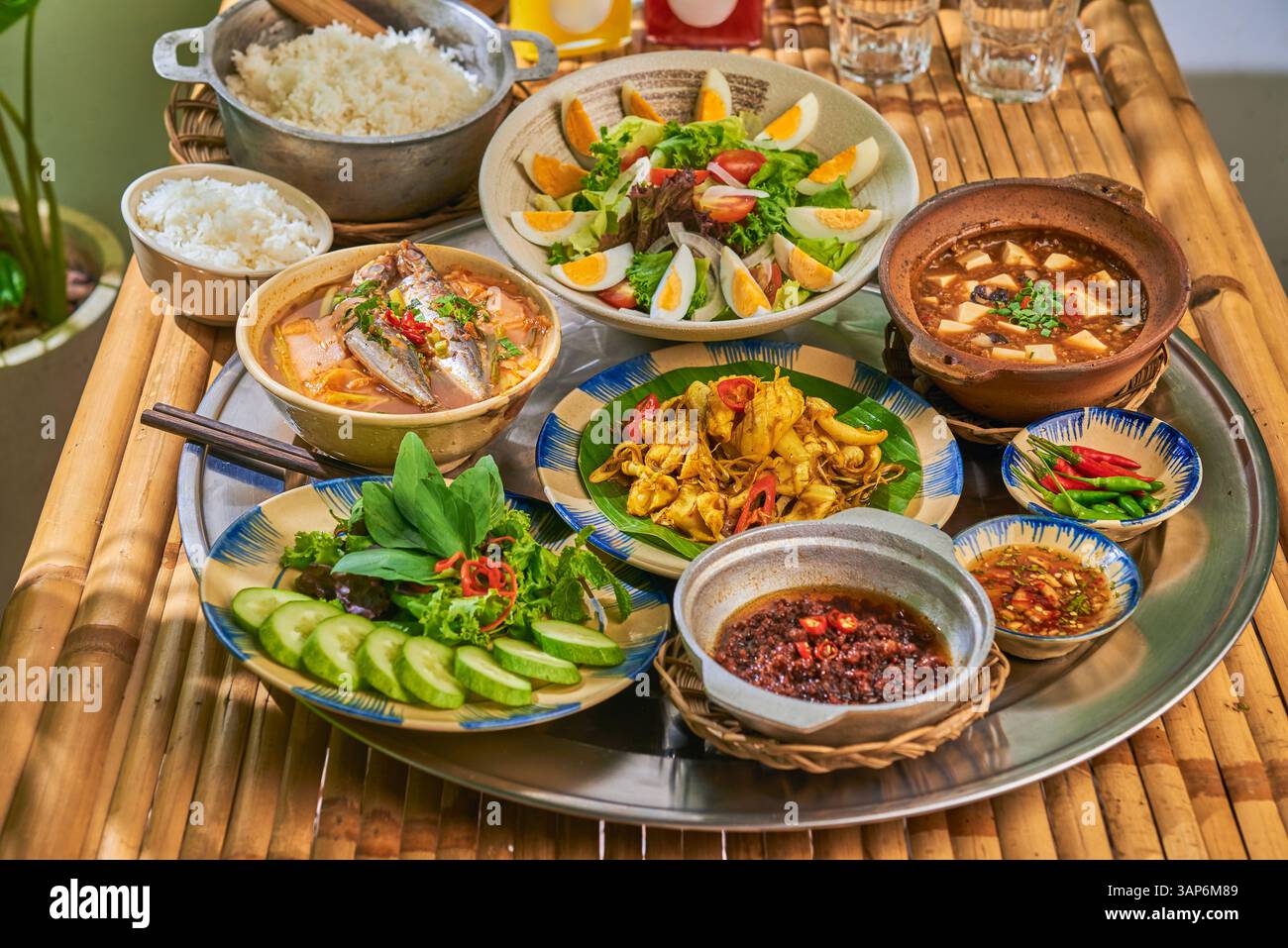 Set of traditional Vietnamese traditional food in large table wodden ...