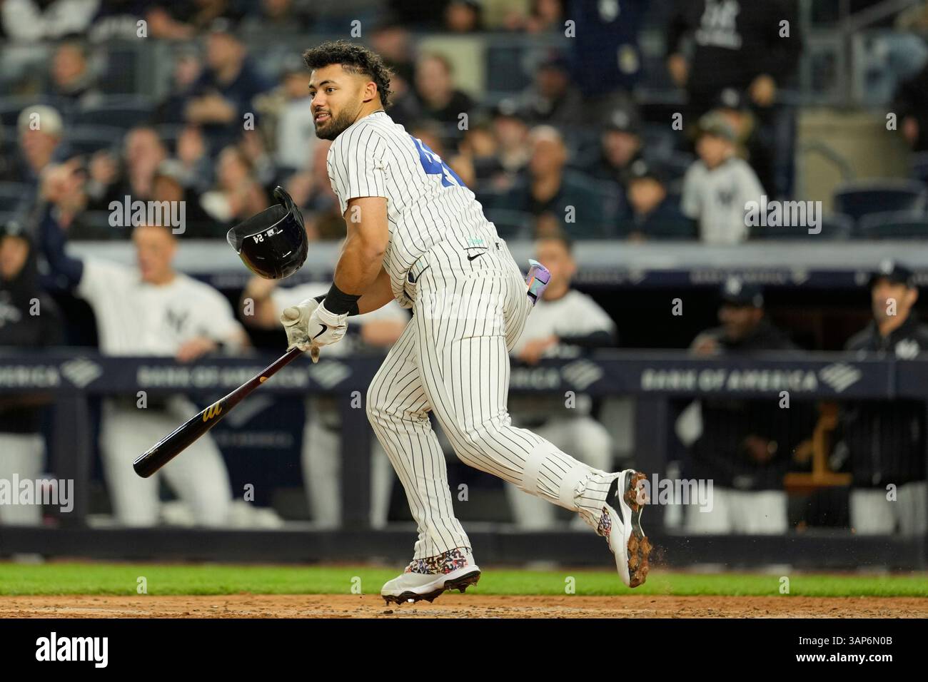 New York Yankees' Jasson Domínguez helmet falls off as he hits a three ...