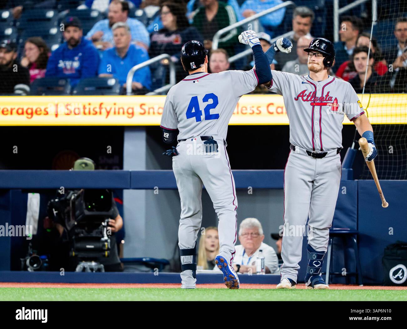 Atlanta Braves infielder Austin Riley (left) celebrates a home run with ...