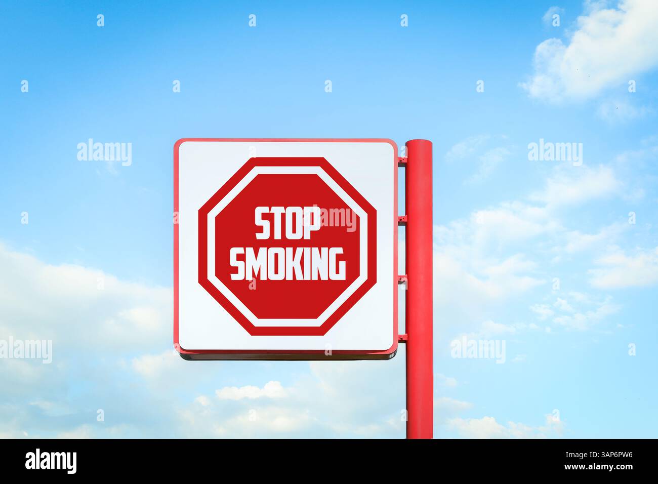 Stop Smoking sign against blue sky with clouds Stock Photo - Alamy