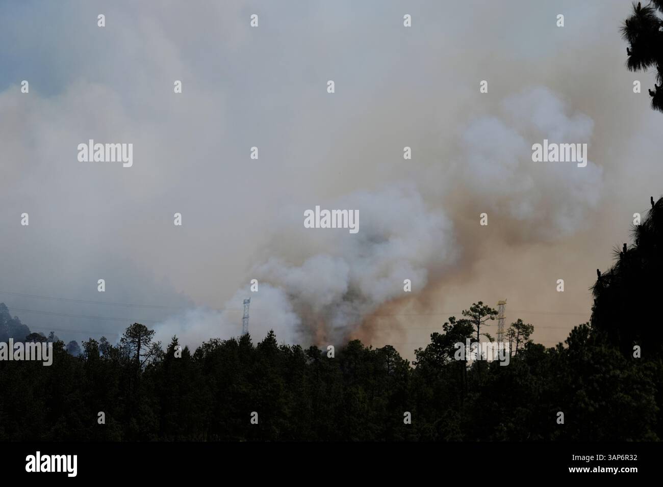 Smoke rises from wildfires outside of Cuernavaca, Mexico, Tuesday ...