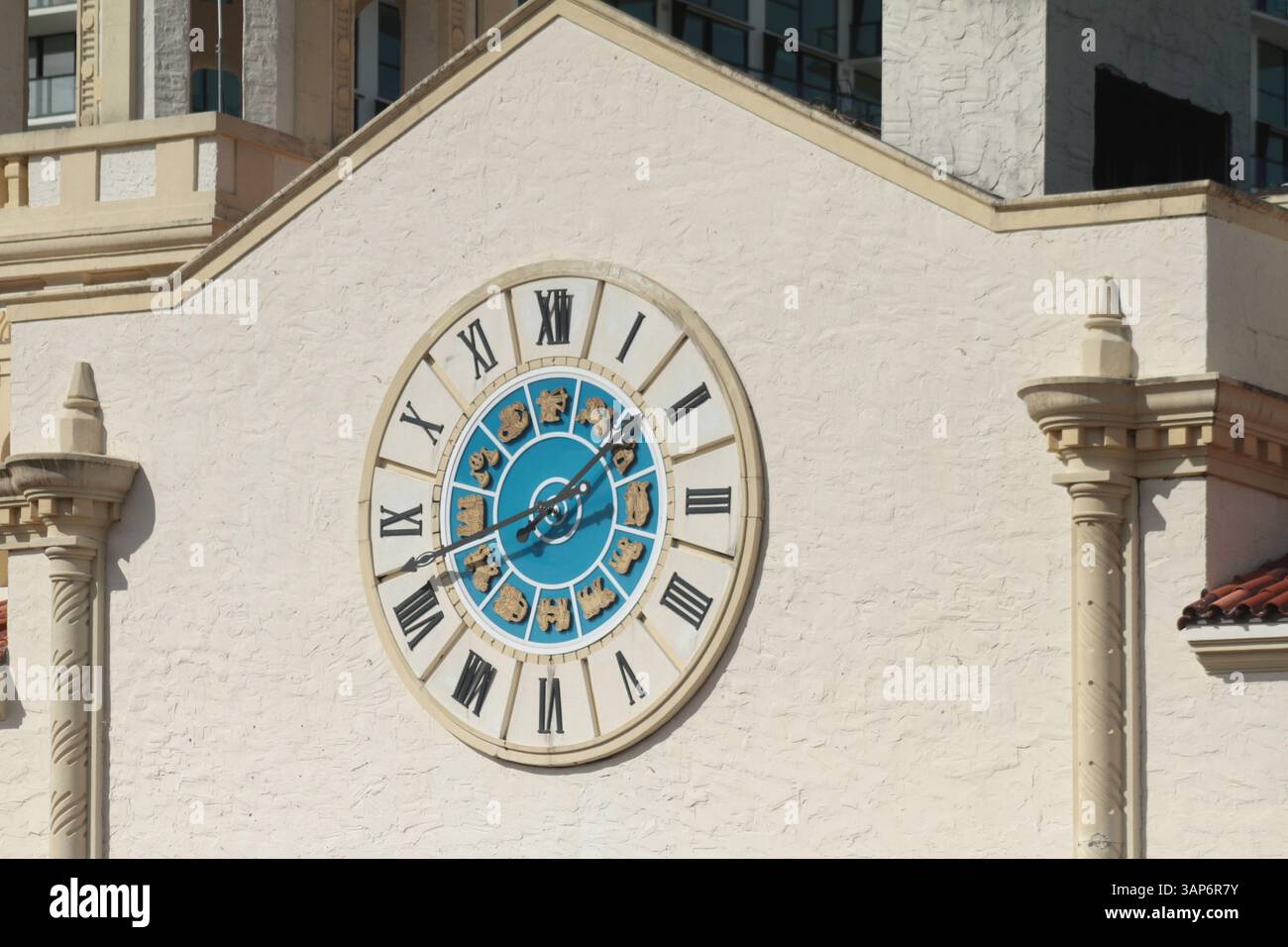 Florida, USA. Large clock on the facade of a building in downtown West ...